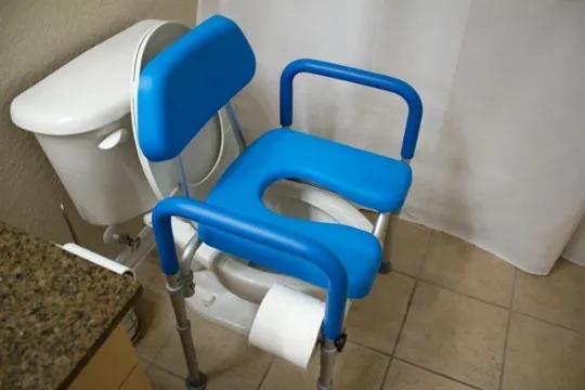 Dignity Three-in-One Commode Chair by Platinum Health
